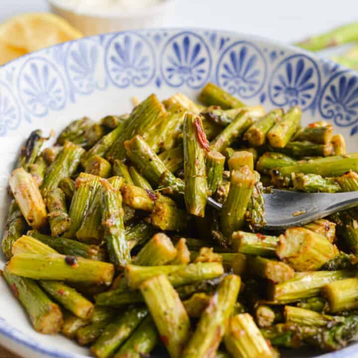 10-Minute Spicy Parmesan Air Fryer Asparagus - Nourished by Nic